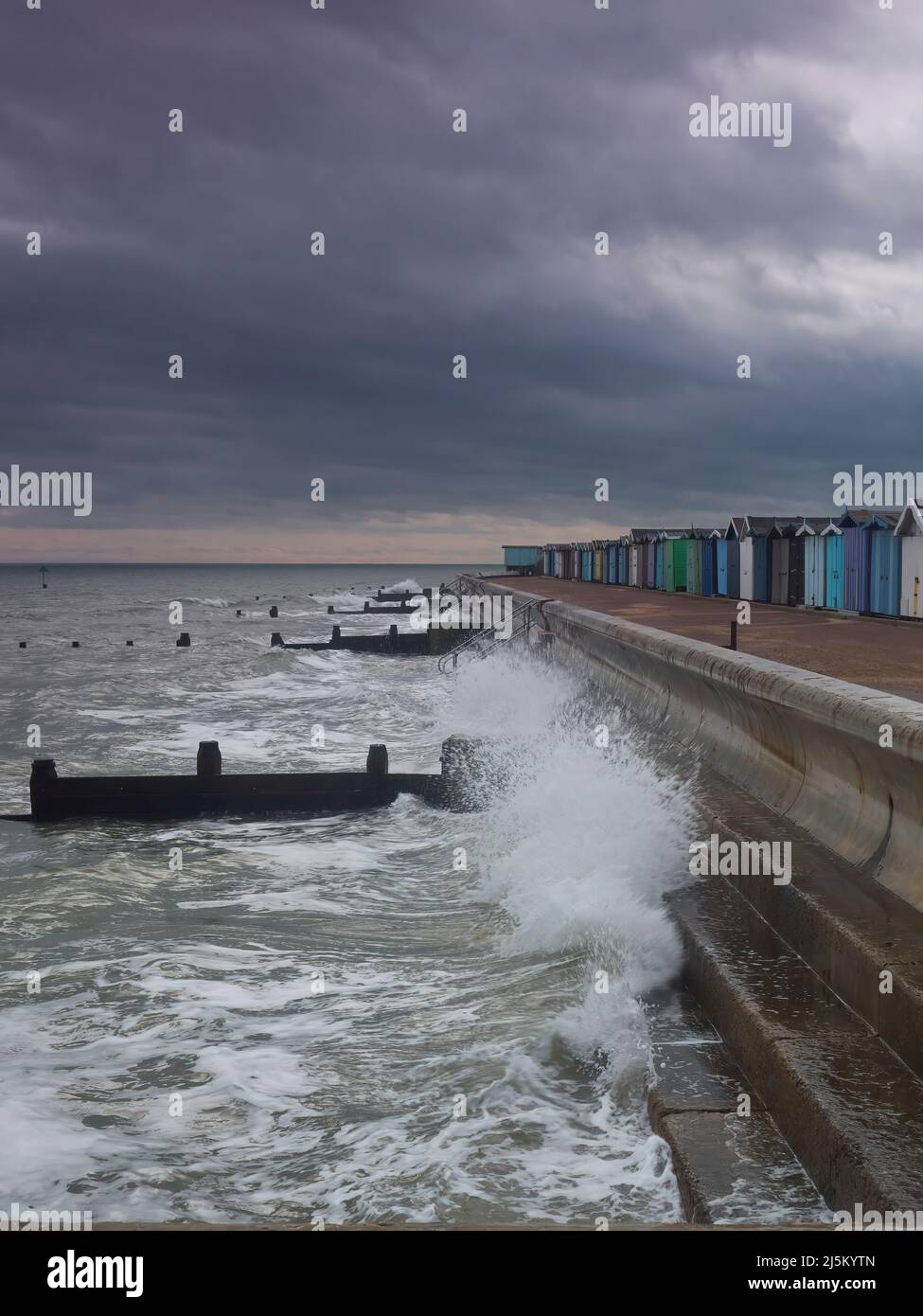 Dramatic waves crash on the sea wall hi-res stock photography and ...