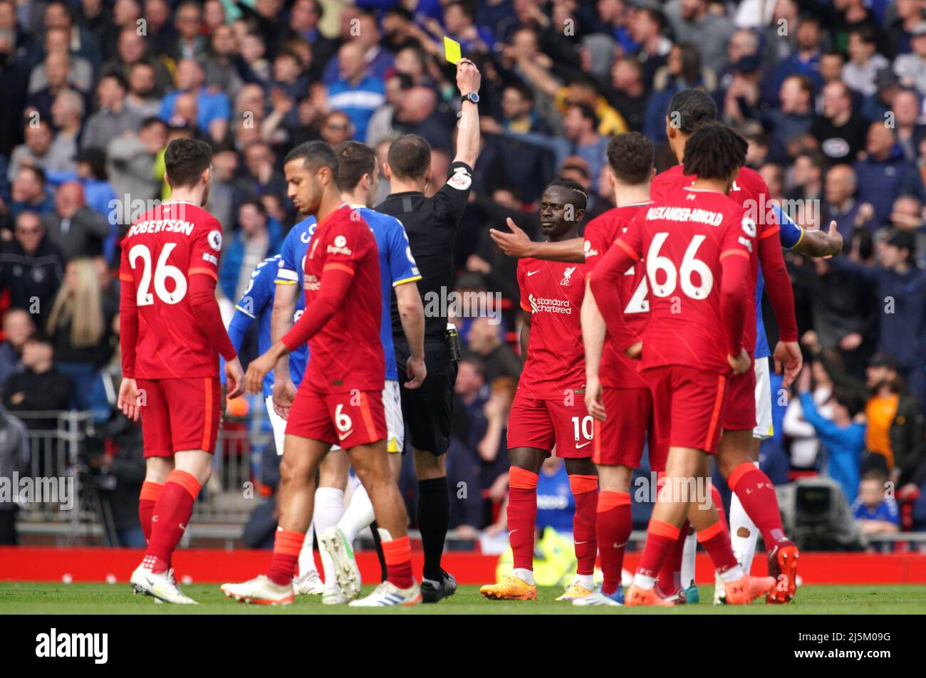 Referee stuart attwell shows a yellow card hi-res stock photography and ...
