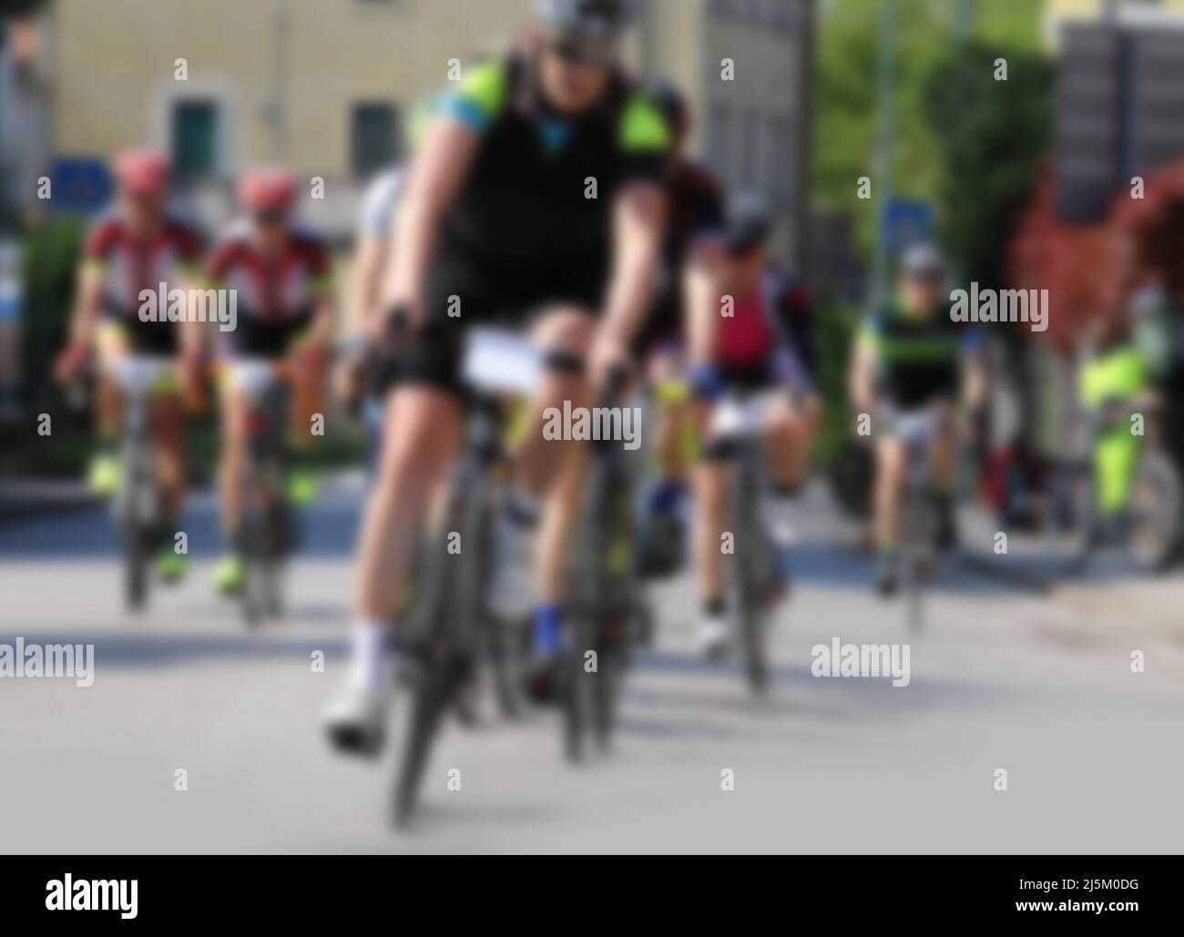 Intentionally out of focus of cyclists during the cycling race as they ...