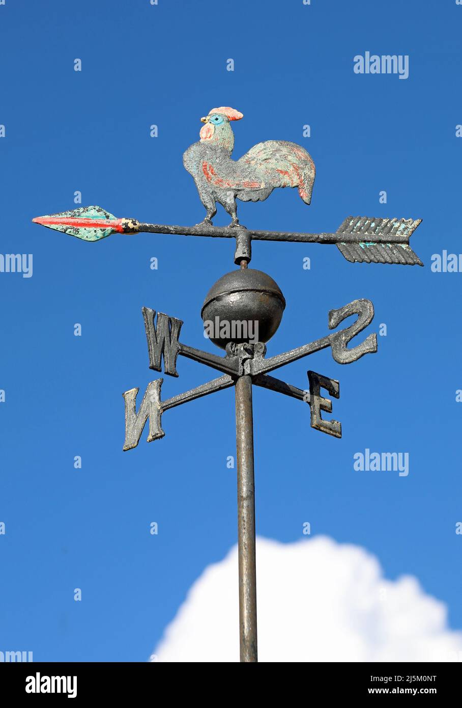 vintage vane to indicate the direction of the wind with the initials of ...