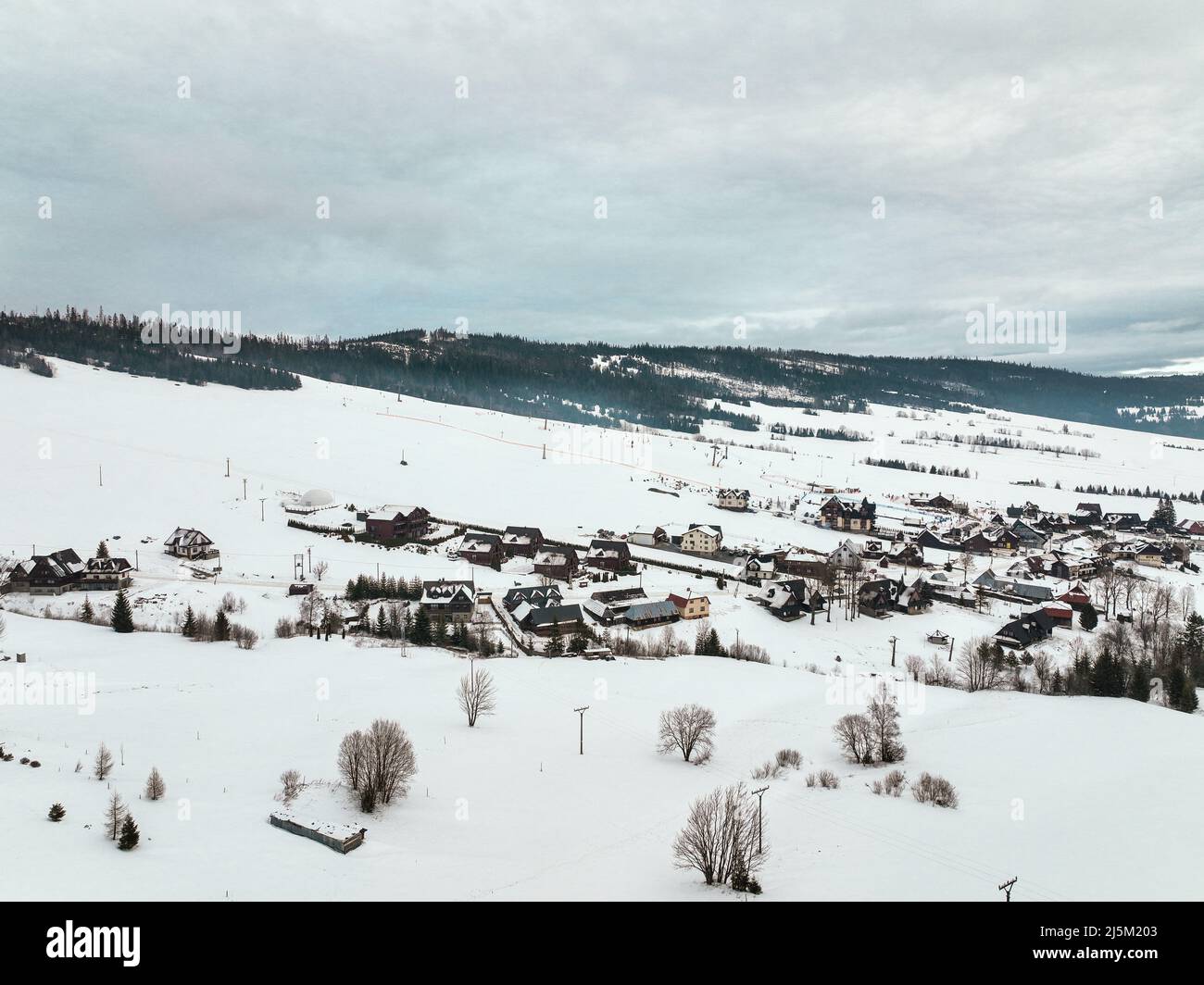 Aerial view of the village of Zdiar and the High Tatras in Slovakia ...