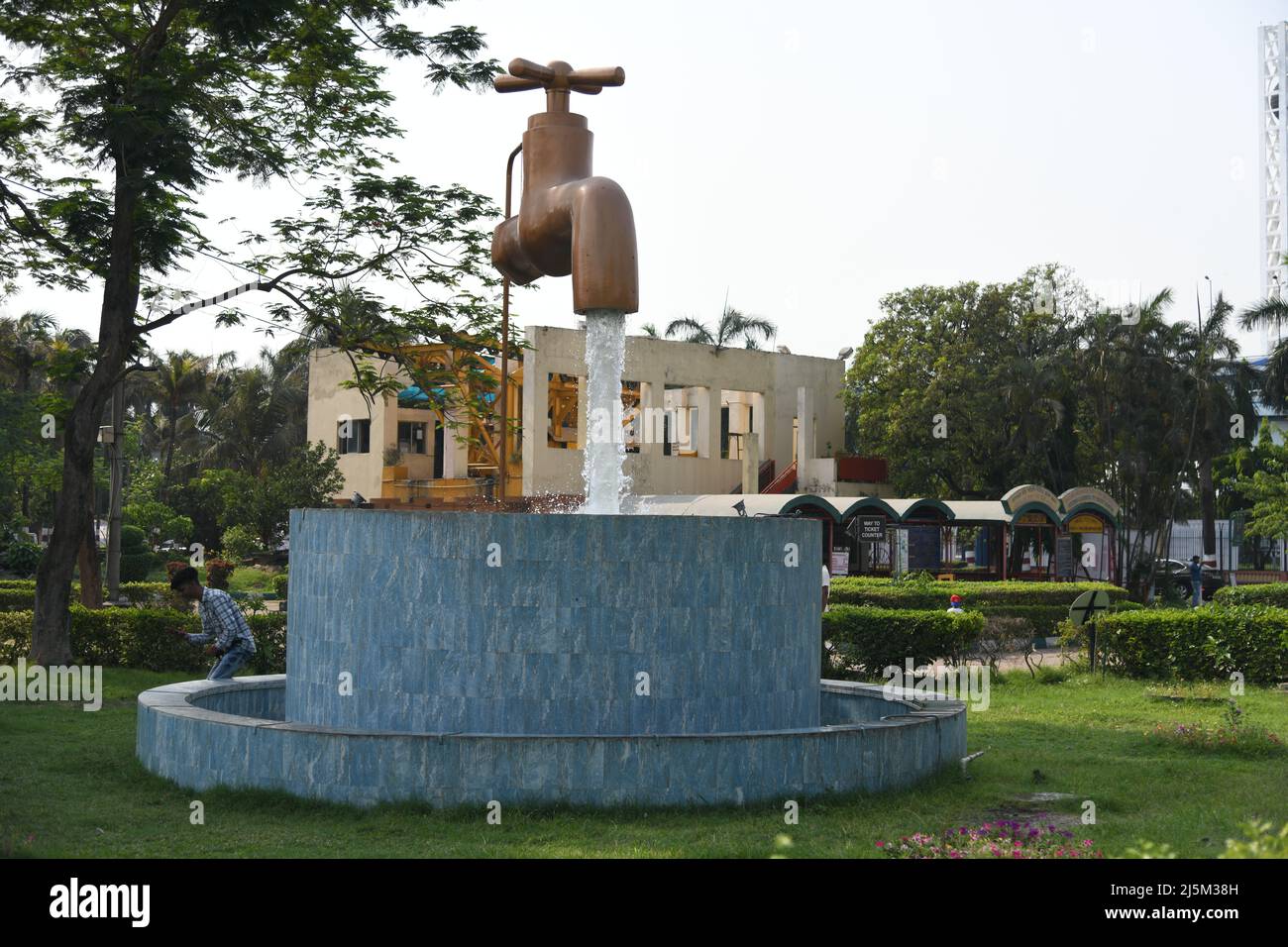 Giant Magic Tap, an outdoor floating tap fountain hovering above a pool ...