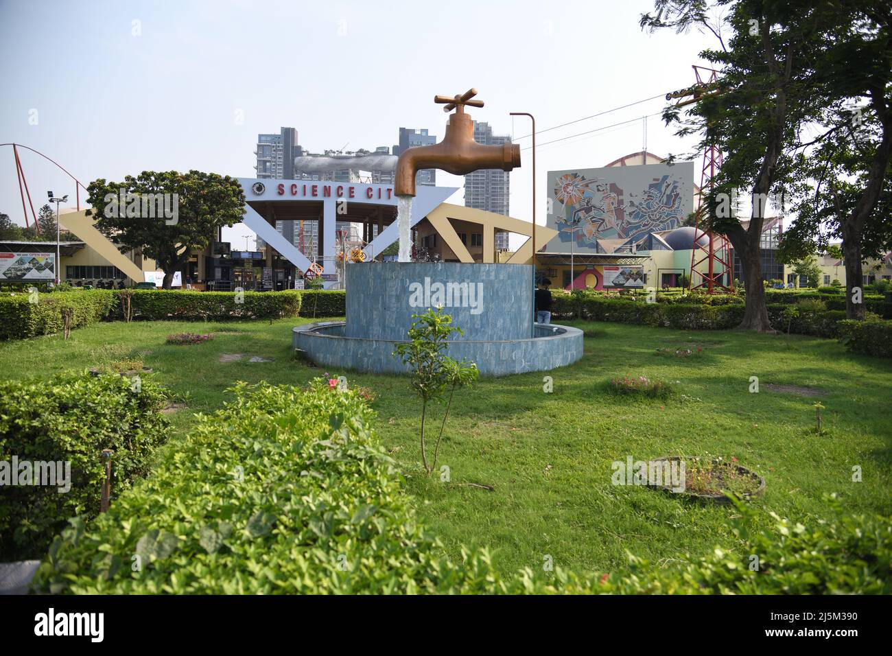 Giant Magic Tap, an outdoor floating tap fountain hovering above a pool ...