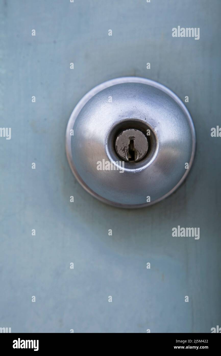Close-up of a stainless steel doorknob with a keyhole Stock Photo - Alamy