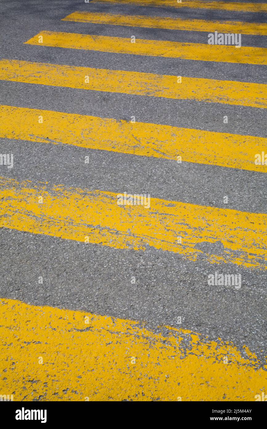 Yellow striped crosswalk Stock Photo - Alamy