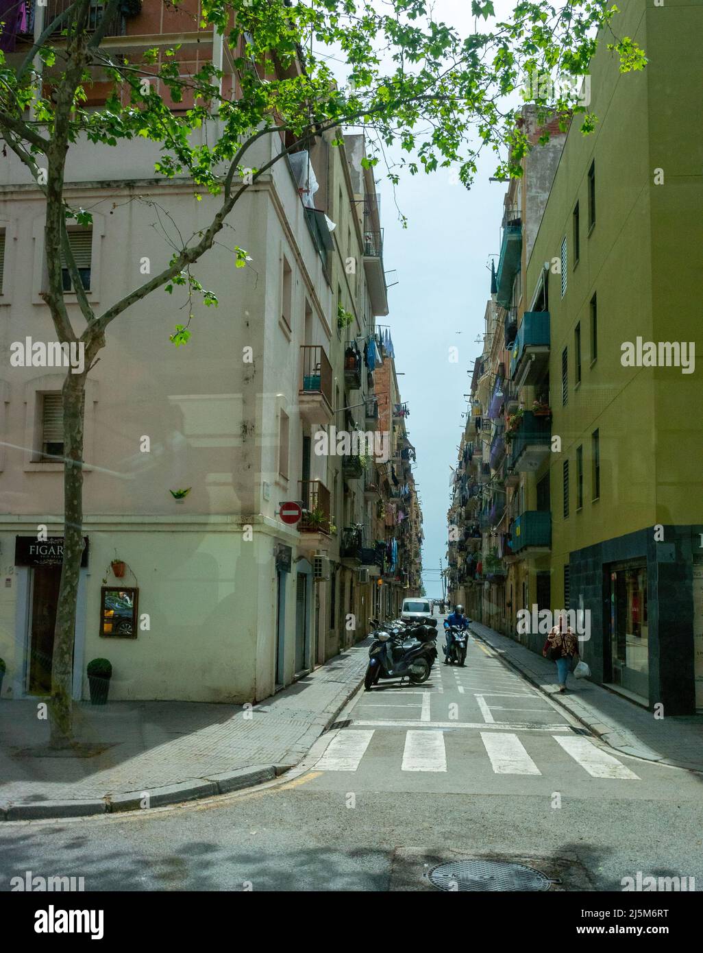 Barcelona, Spain, Apartment Buildings, along Empty Street Scene, View ...