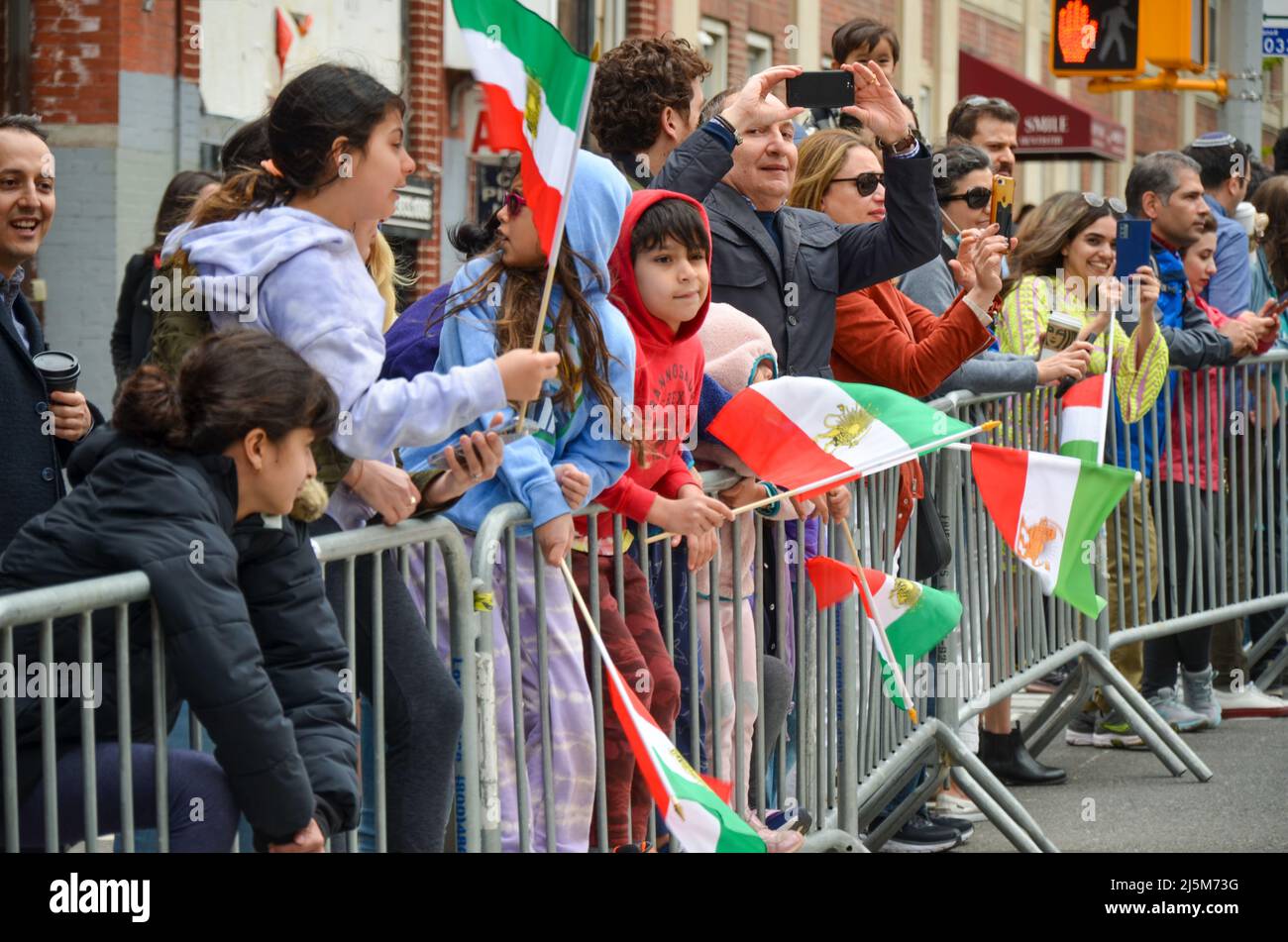 Spectators holding Iranian flags on Madison Avenue in New York City to ...