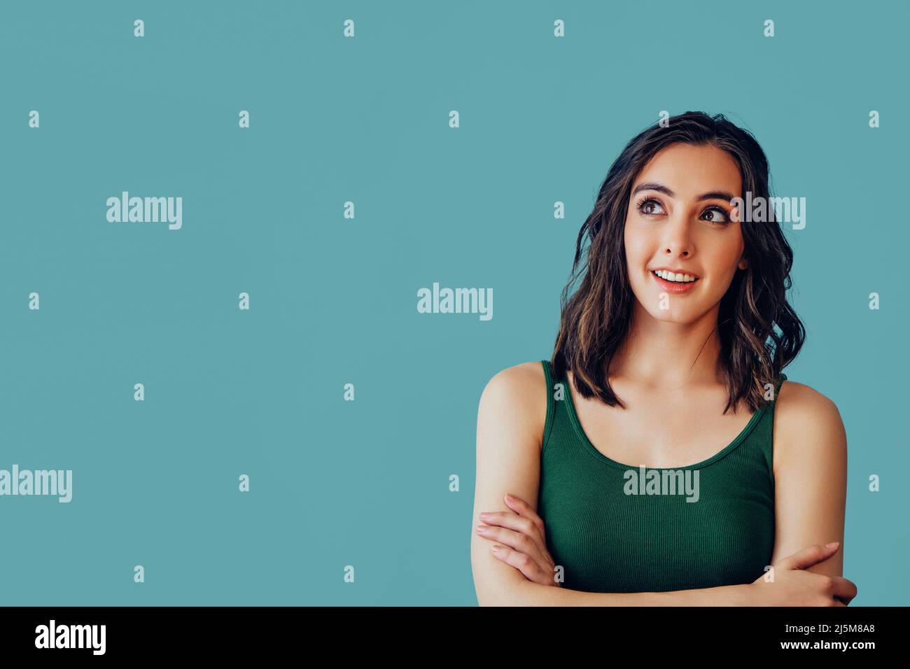 Woman laugh beautiful crossed arms hi-res stock photography and images ...