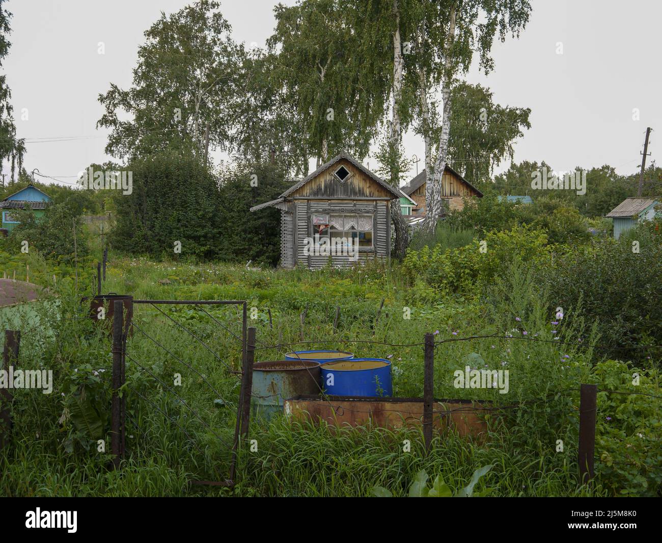 A small old one-story wooden house left by the inhabitants of the house ...