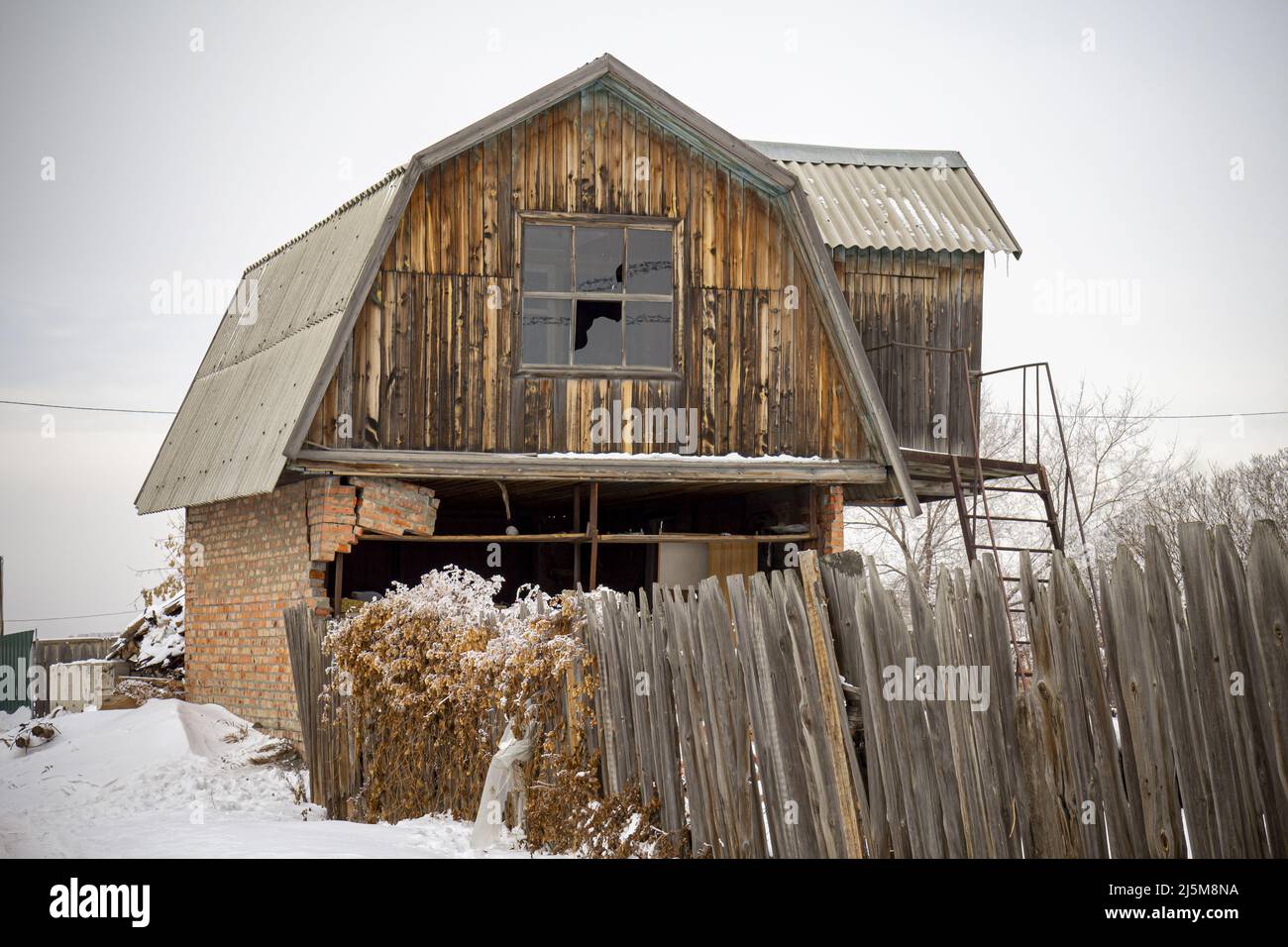 The attic and wall of the first floor of a residential village two ...