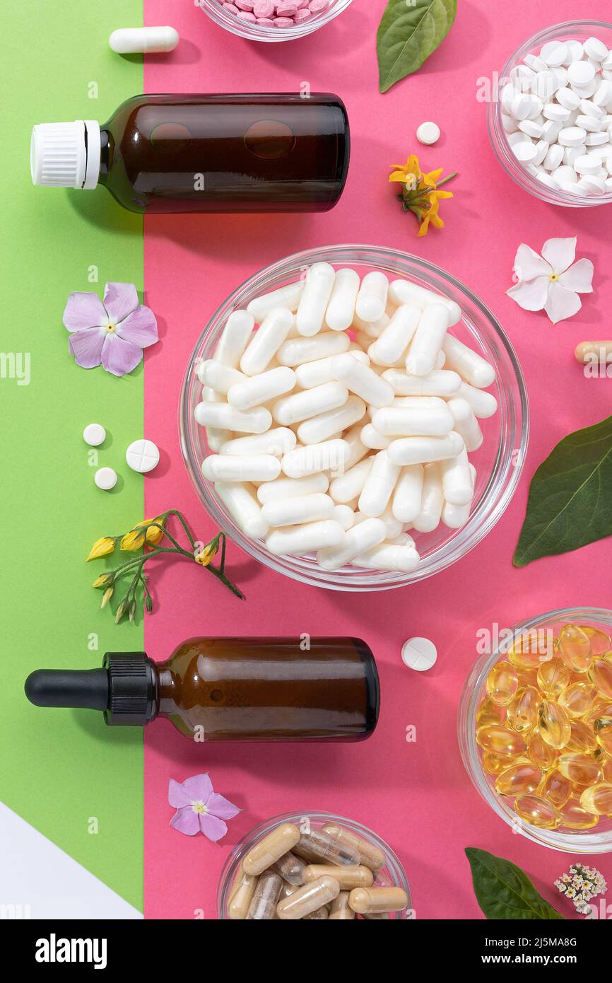 Flat lay composition of various vitamin capsules and dietary ...