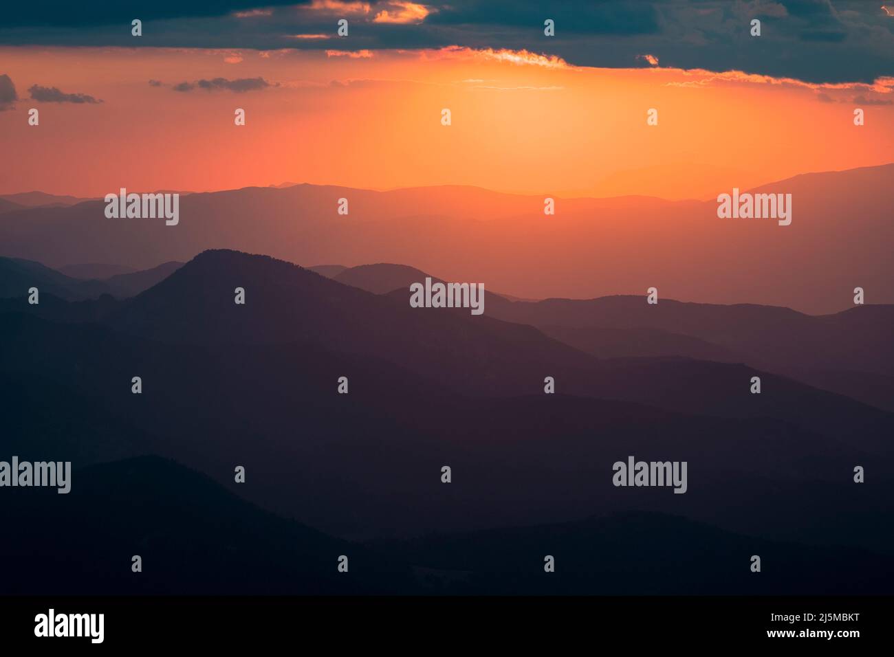 Hills at sunset on the northern slopes of the Serra del Cadí. Catalonia ...