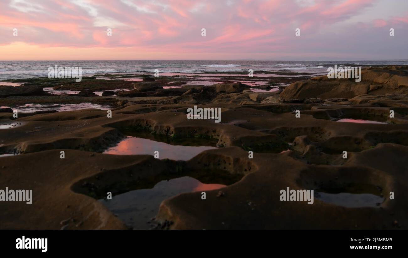 Eroded rock formation, tide pool shape in La Jolla, California coast ...