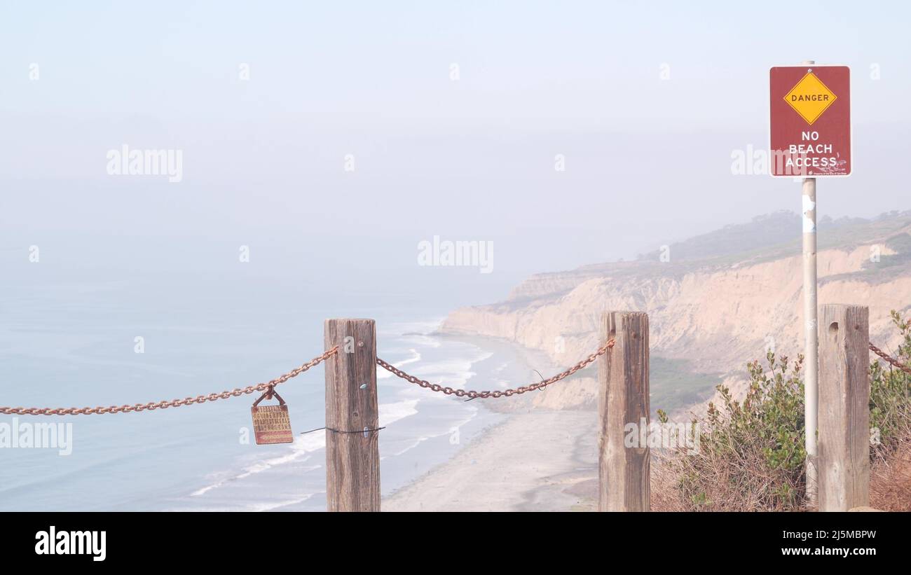 Steep unstable cliff, rock or bluff, foggy weather, California coast ...