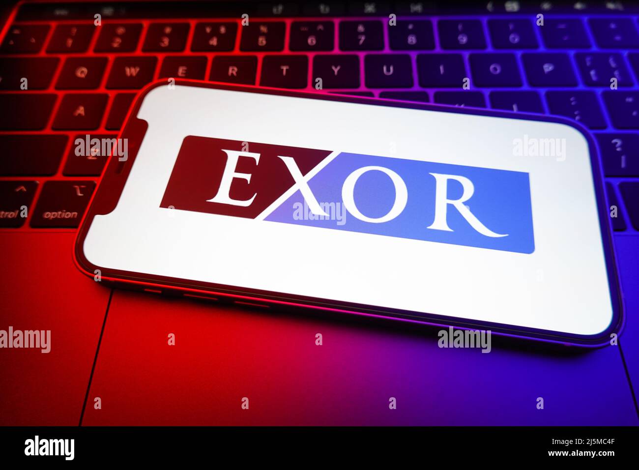 In this photo illustration, an Exor Group logo seen displayed on a ...