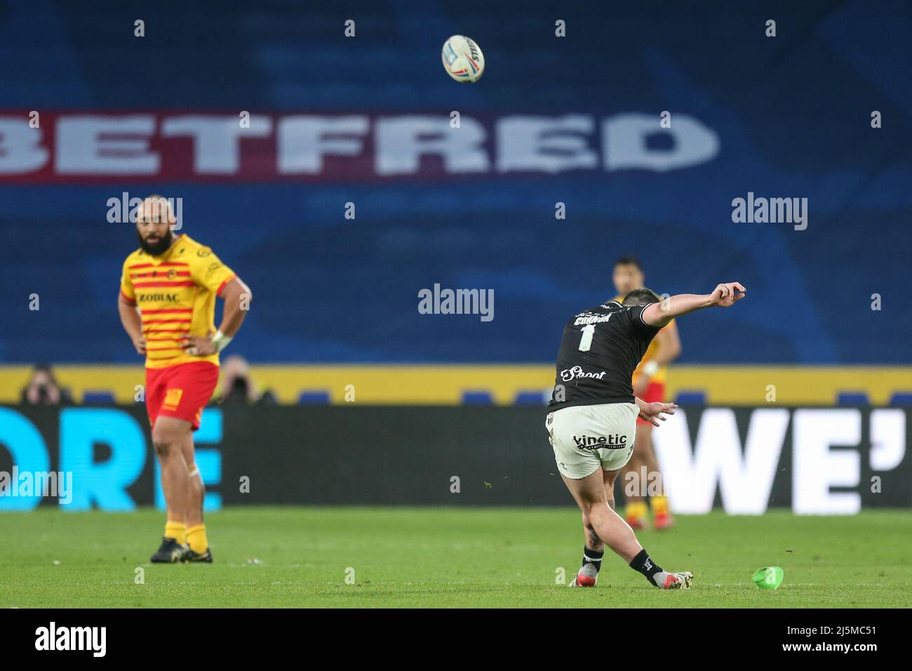 Jake Connor #1 of Hull FC kicks the penalty kick on the stroke of half ...