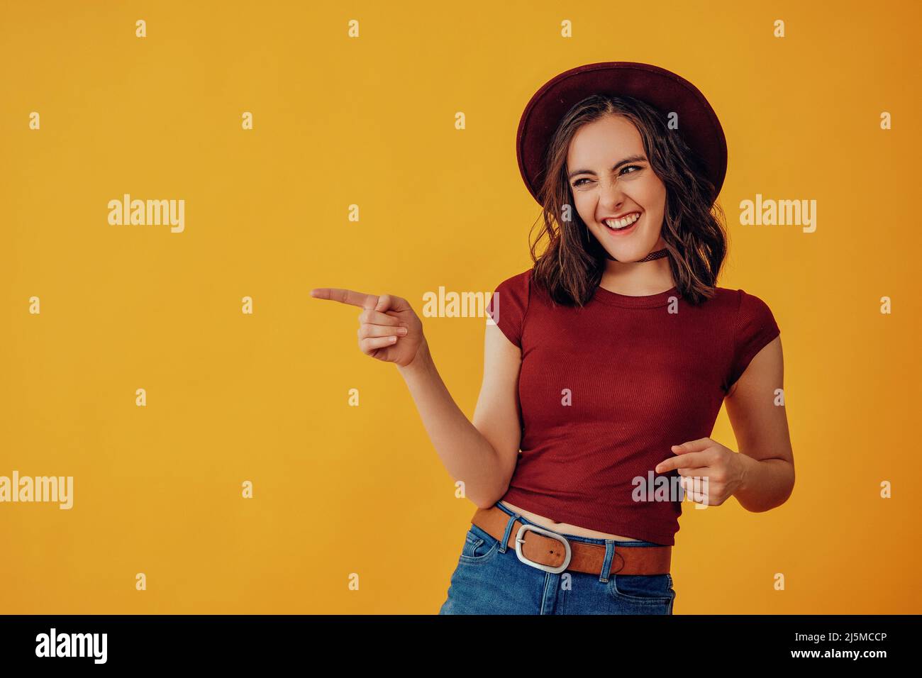 Beautiful woman pointing teeth hi-res stock photography and images - Alamy