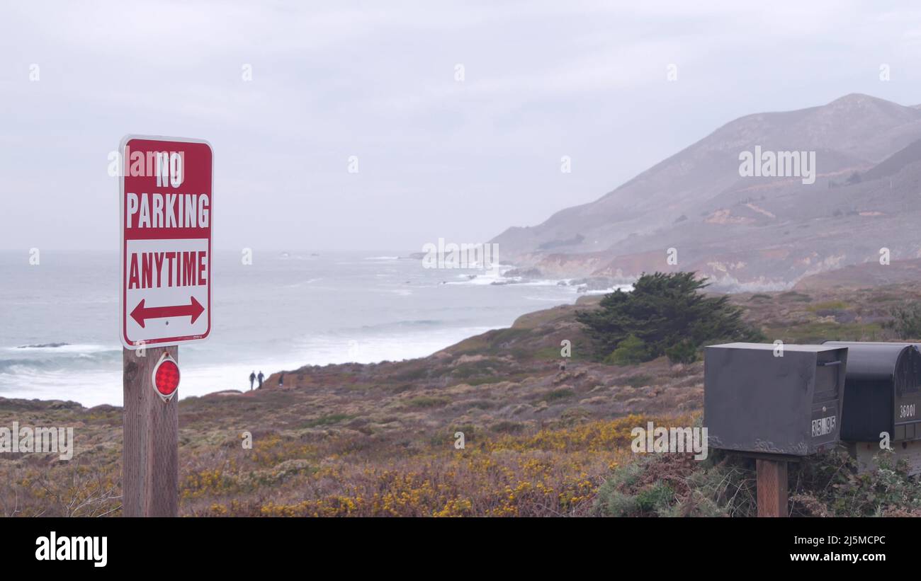 No parking any time road sign on pacific coast highway 1. Postbox or ...