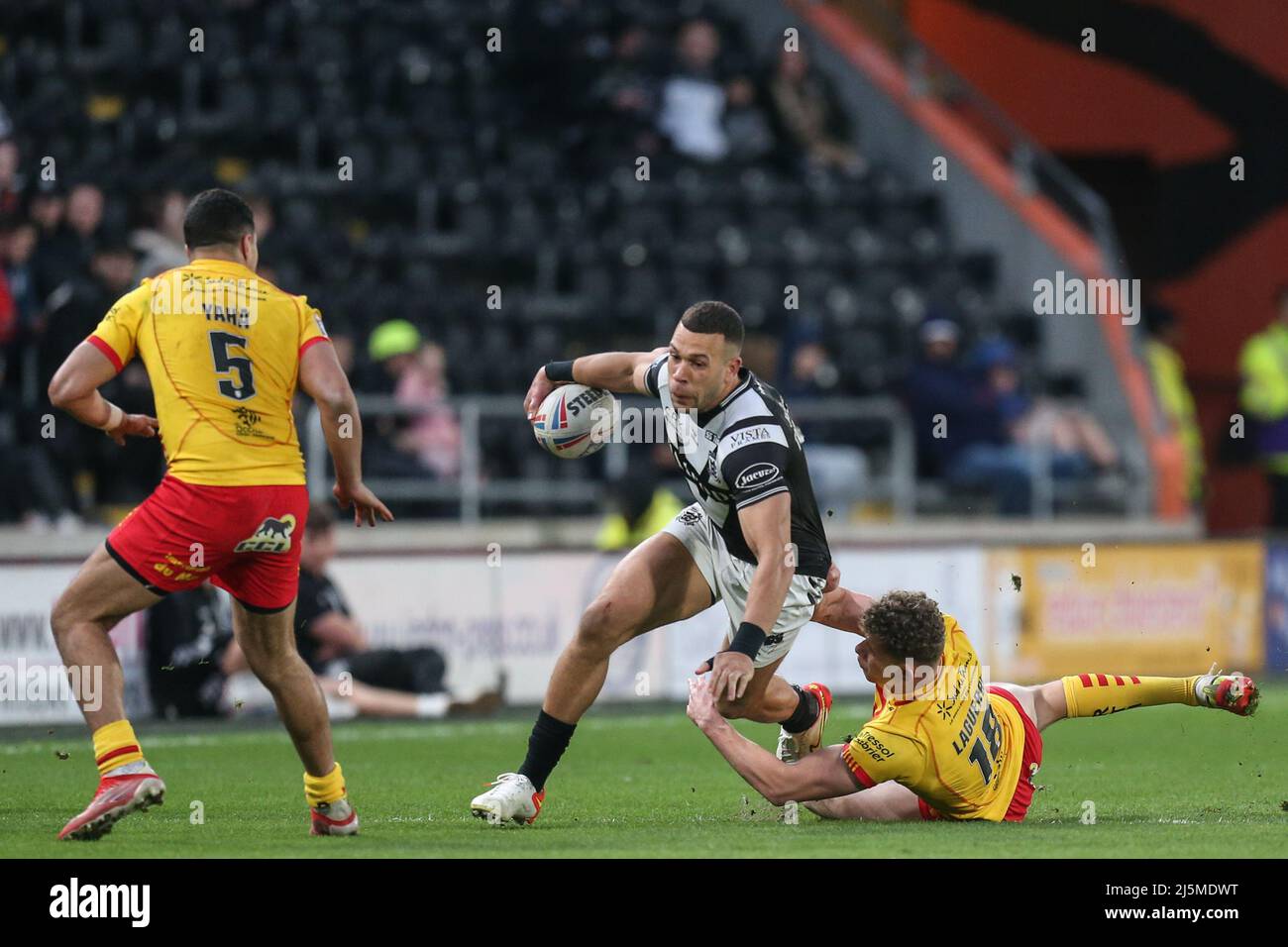 Carlos Tuimavave #3 of Hull FC looks to go past Mathieu Laguerre #18 of ...
