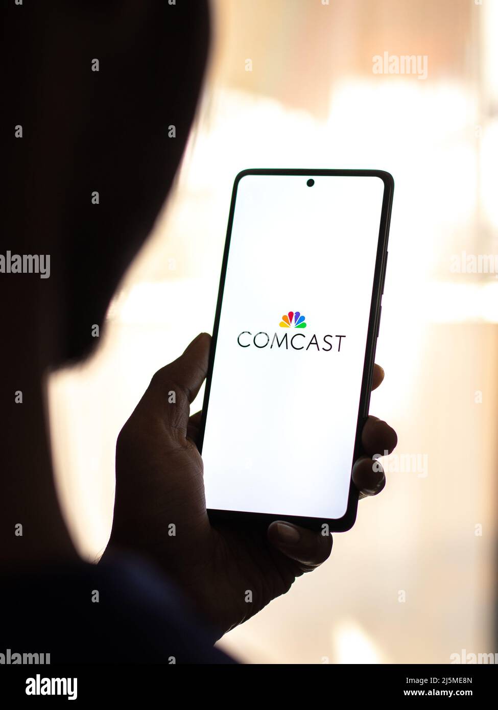 Comcast share hi-res stock photography and images - Alamy