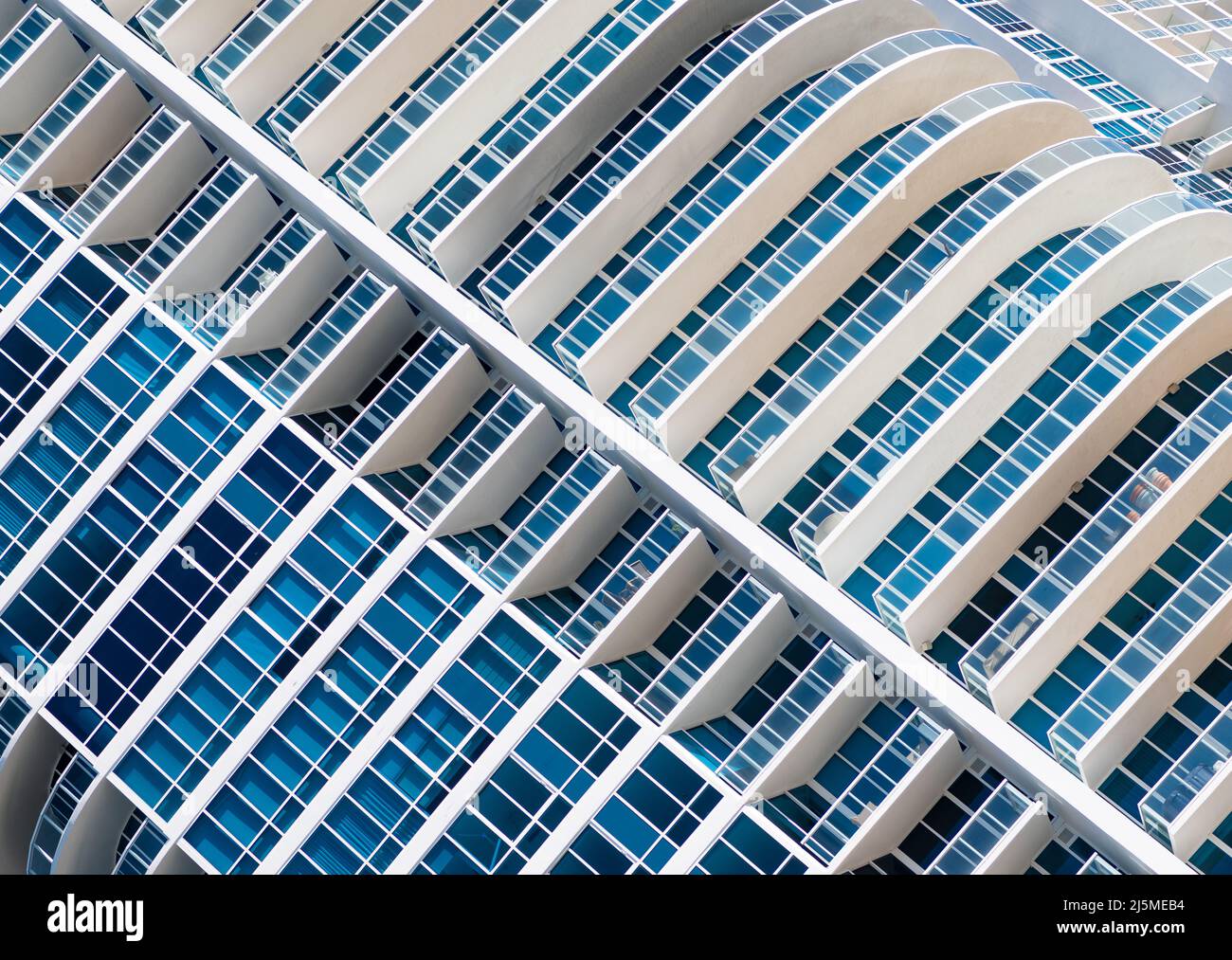 Architecture of modern building with glasses and balconies ...