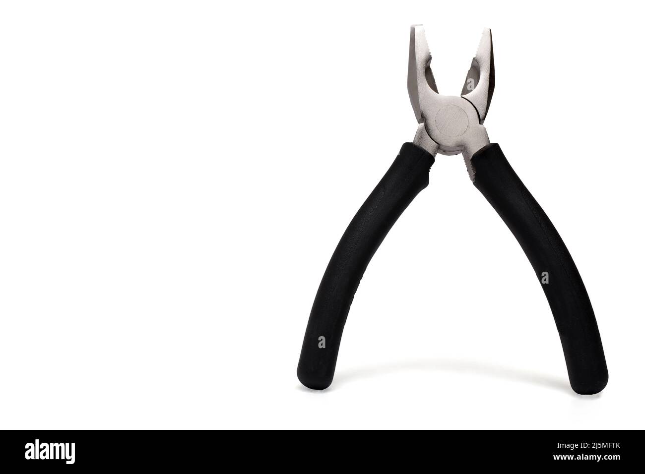 Close up of upright open combination pliers for pushing pulling and ...