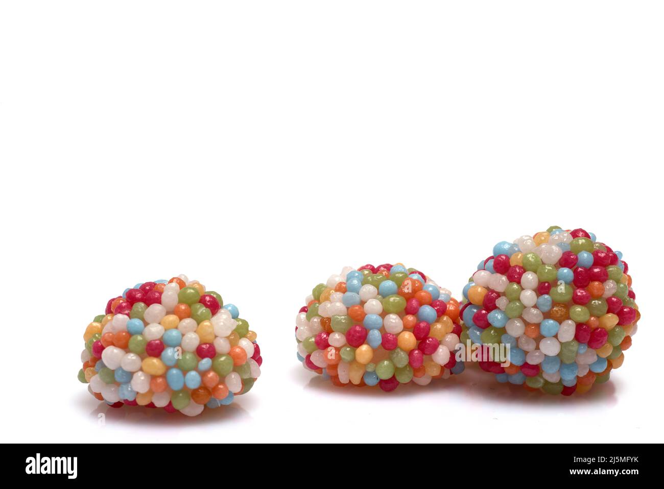 Close up colorful half round gum candy with red orange yellow green ...