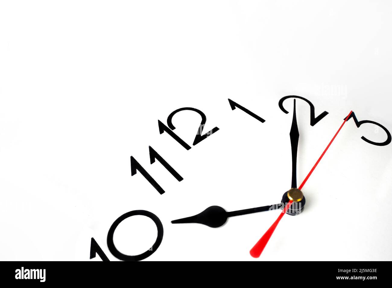 Close up clockwise on black clock face background. Wristwatch in retro ...