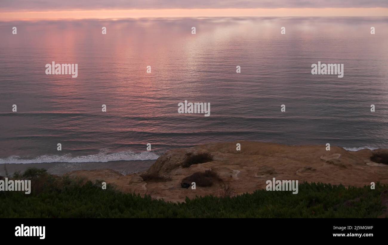 Dramatic cloudscape at sunset, reflection of pink sky, clouds. Torrey ...