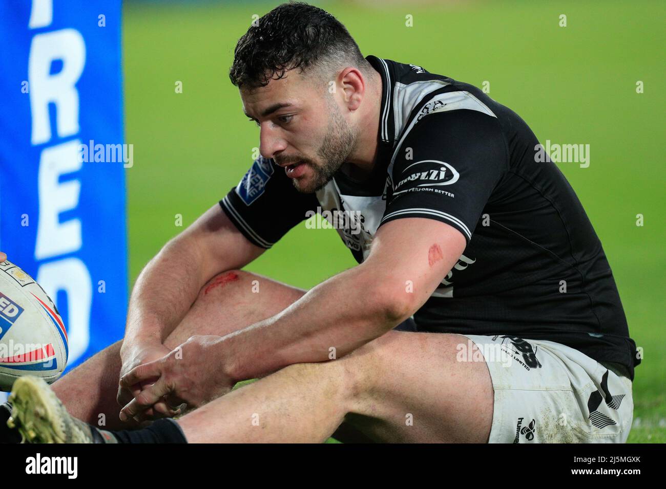 Jake Connor #1 of Hull FC sits on the floor after failing to catch ...