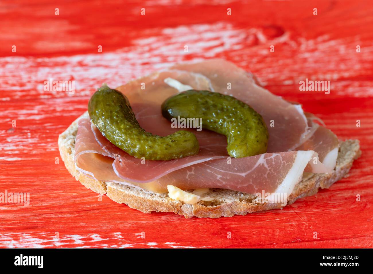 ham sandwich on red background Stock Photo - Alamy