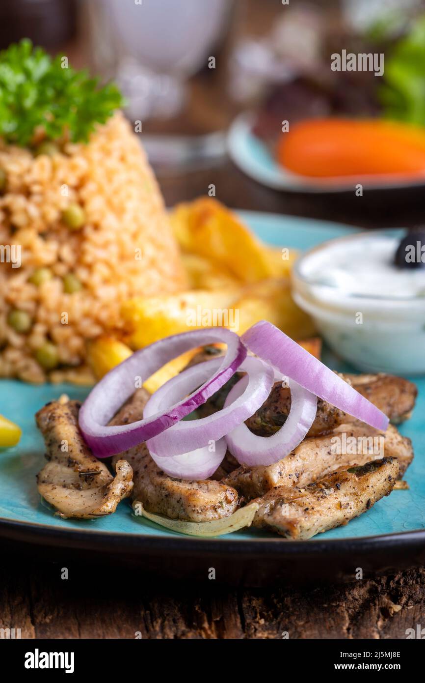 greek gyros with rice on wood Stock Photo - Alamy