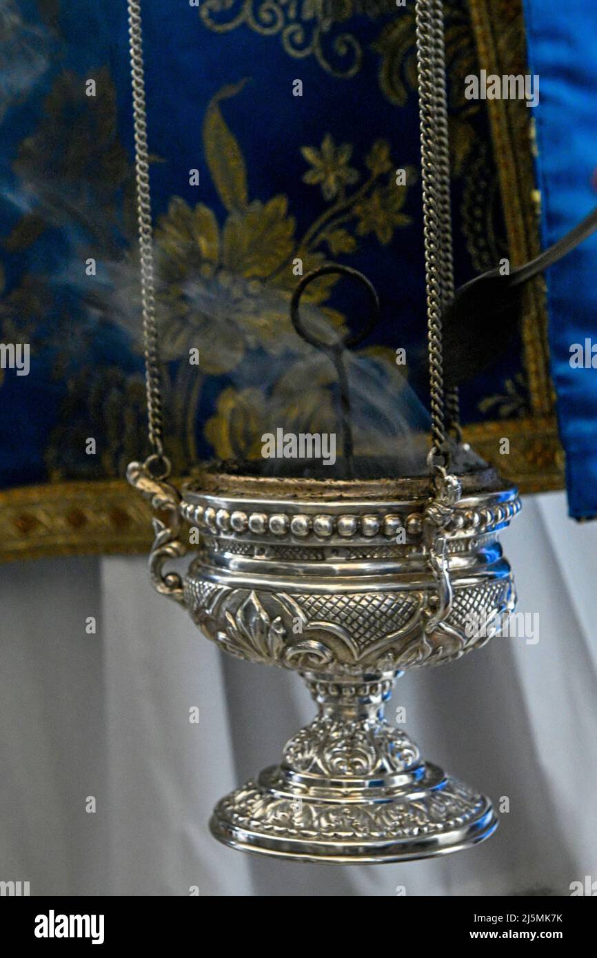 Silver censer lit and smoke rising during a procession Stock Photo - Alamy