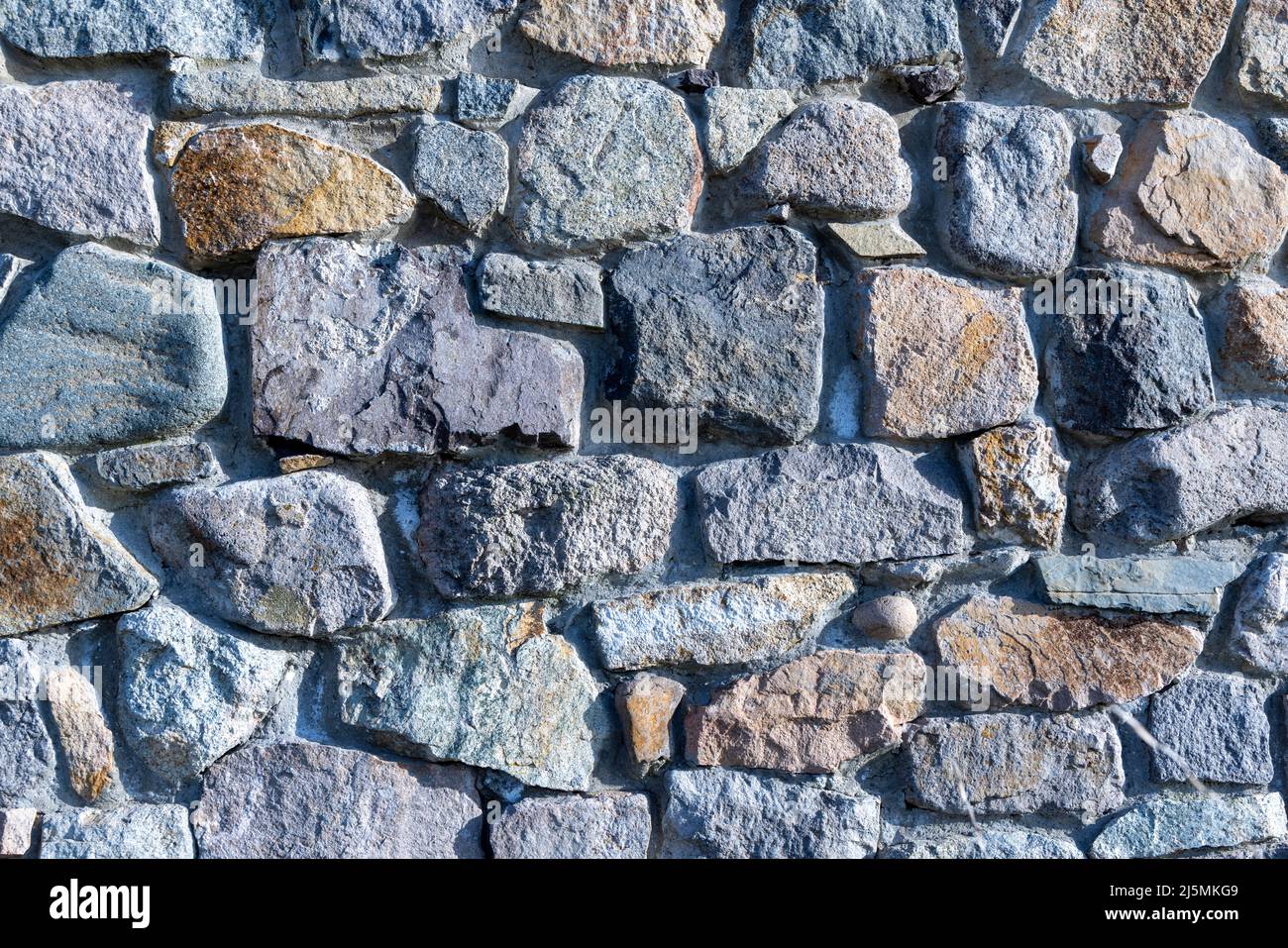 Ancient gray texture background from an ancient strong uneven wall with ...
