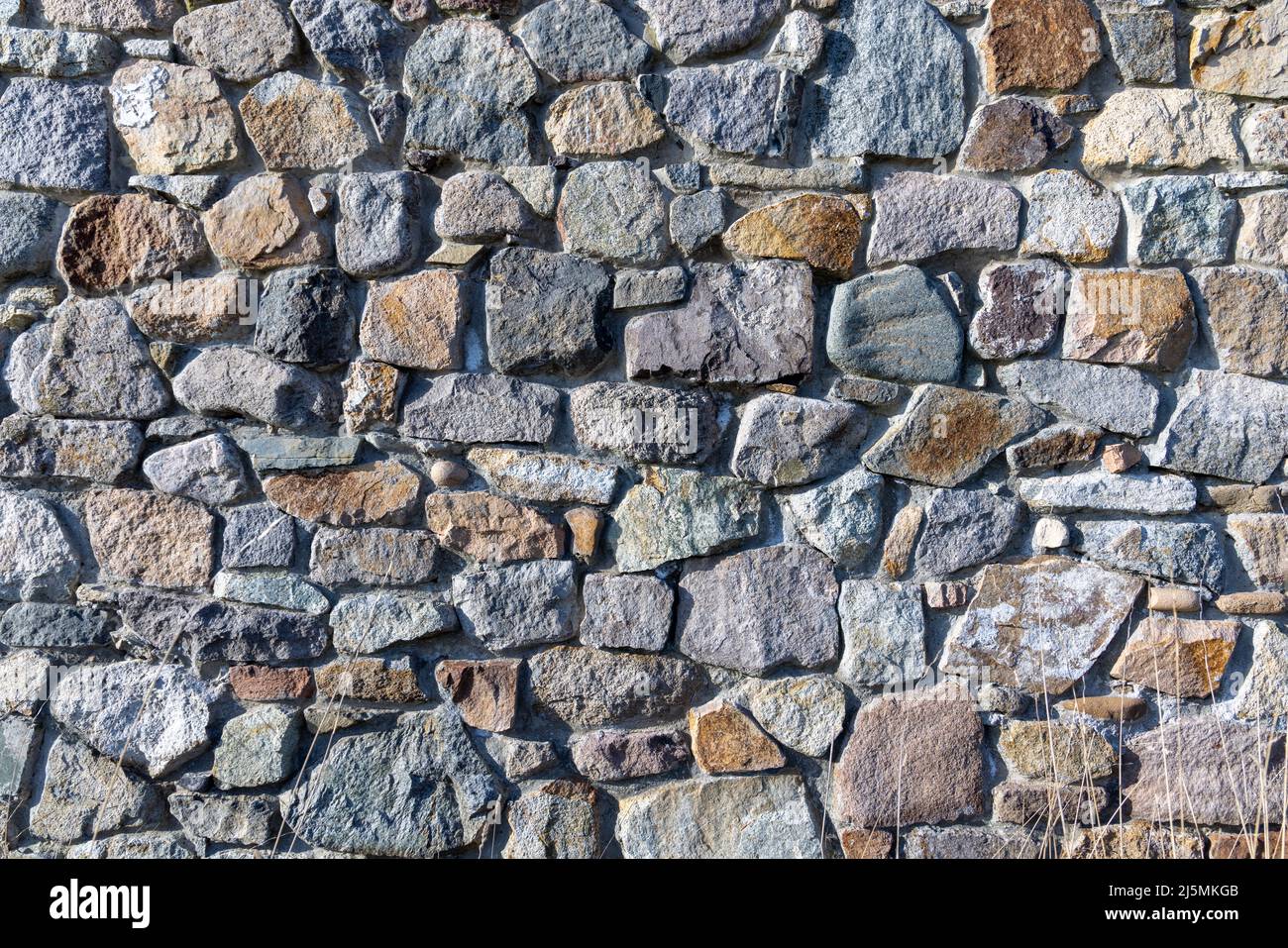 Ancient gray texture background from an ancient strong uneven wall with ...