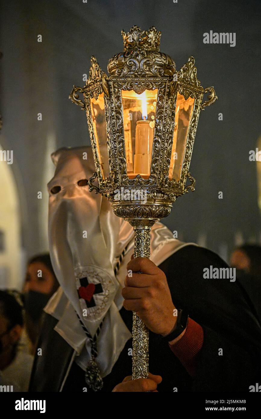 Penitent with a candlestick, in a procession in Holy Week Stock Photo ...