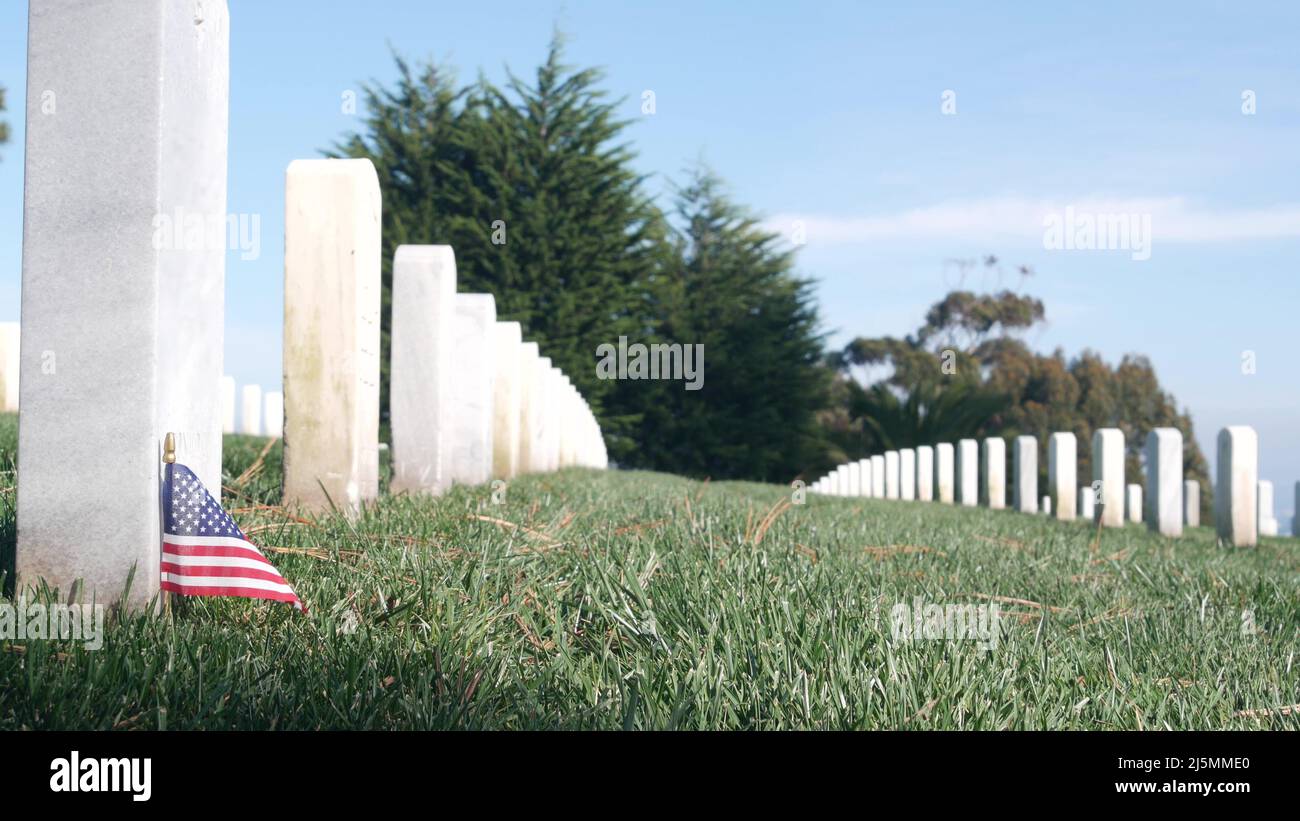 Tombstones and american flag, national memorial cemetery, military ...
