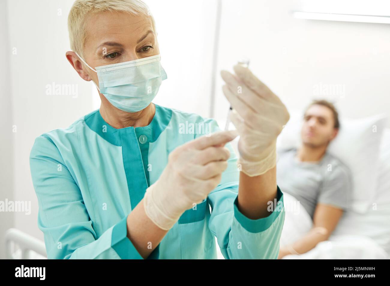 Syringe drawing liquid from medical hi-res stock photography and images ...