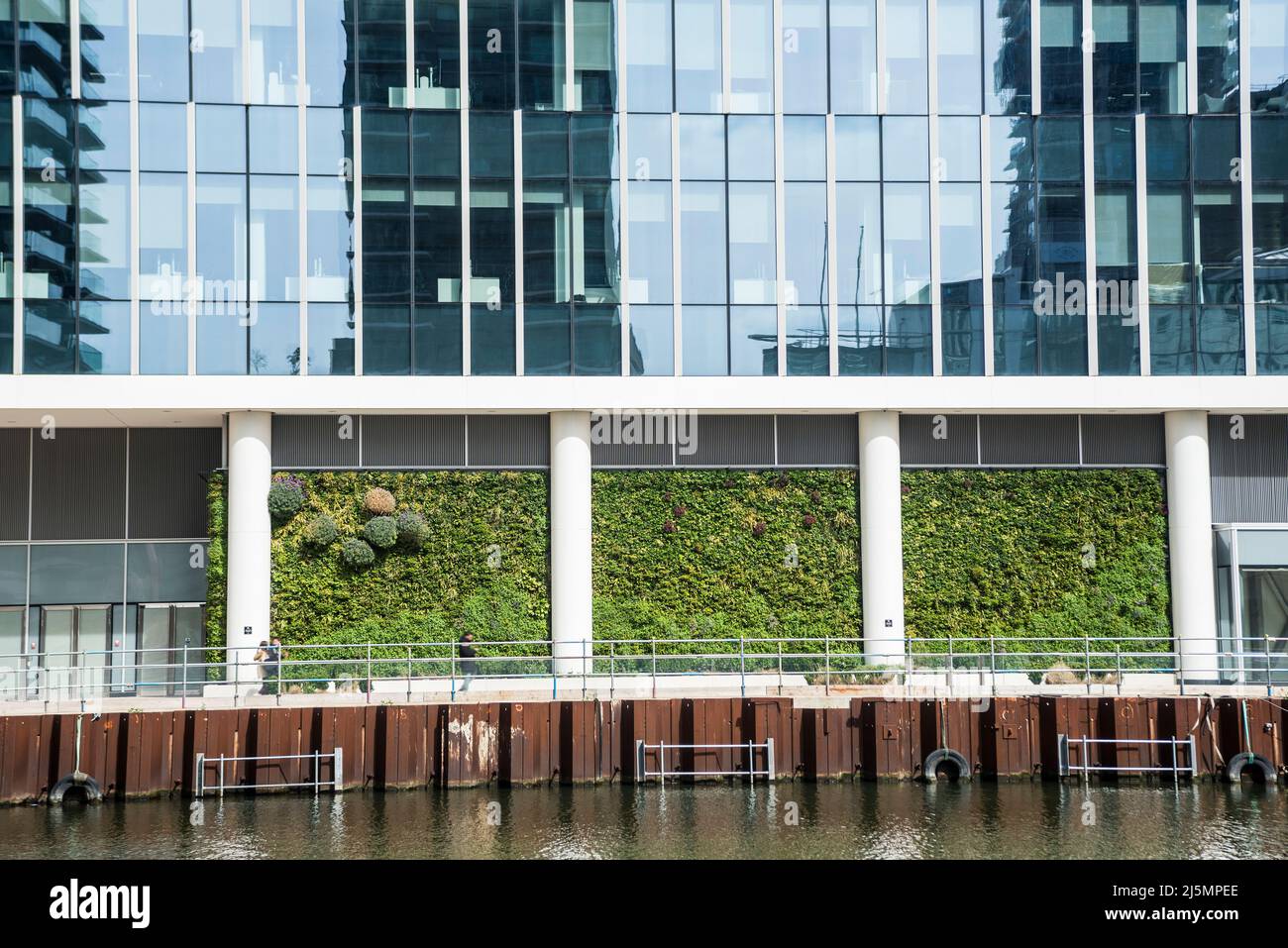 Modern office block development in London with a living wall. Soothing ...