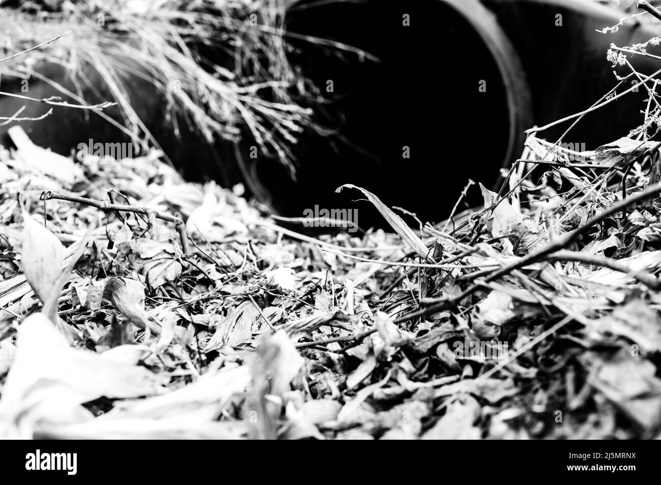 HDPE drainage culvert under a road entrance. Pipe is used to convey ...
