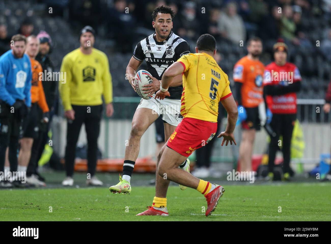 Darnell McIntosh #5 of Hull FC looks to go past Fouad Yaha #5 of Catalans Dragons Stock Photo ...