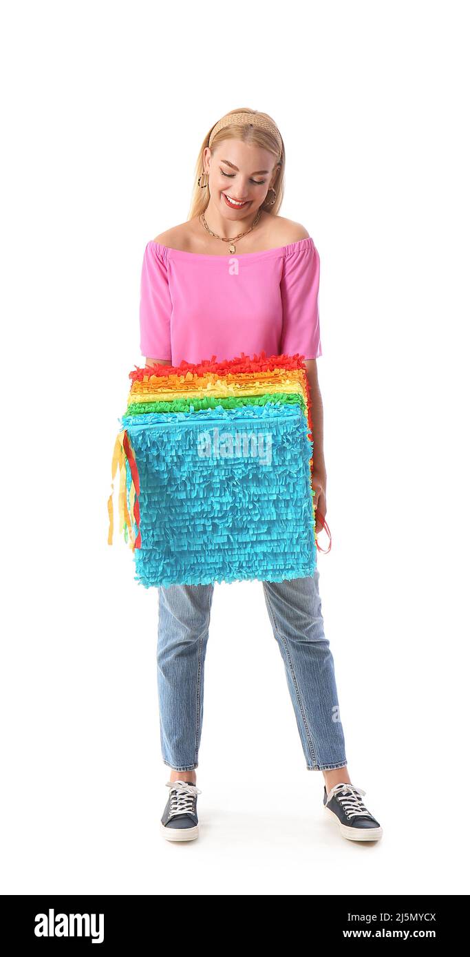 Happy young woman with Mexican pinata on white background Stock Photo ...