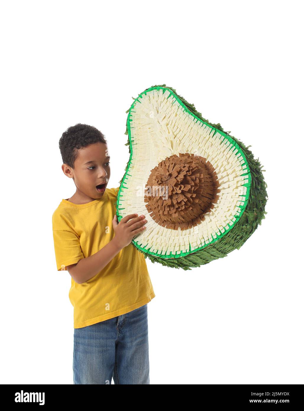 Surprised little boy with Mexican pinata on white background Stock ...