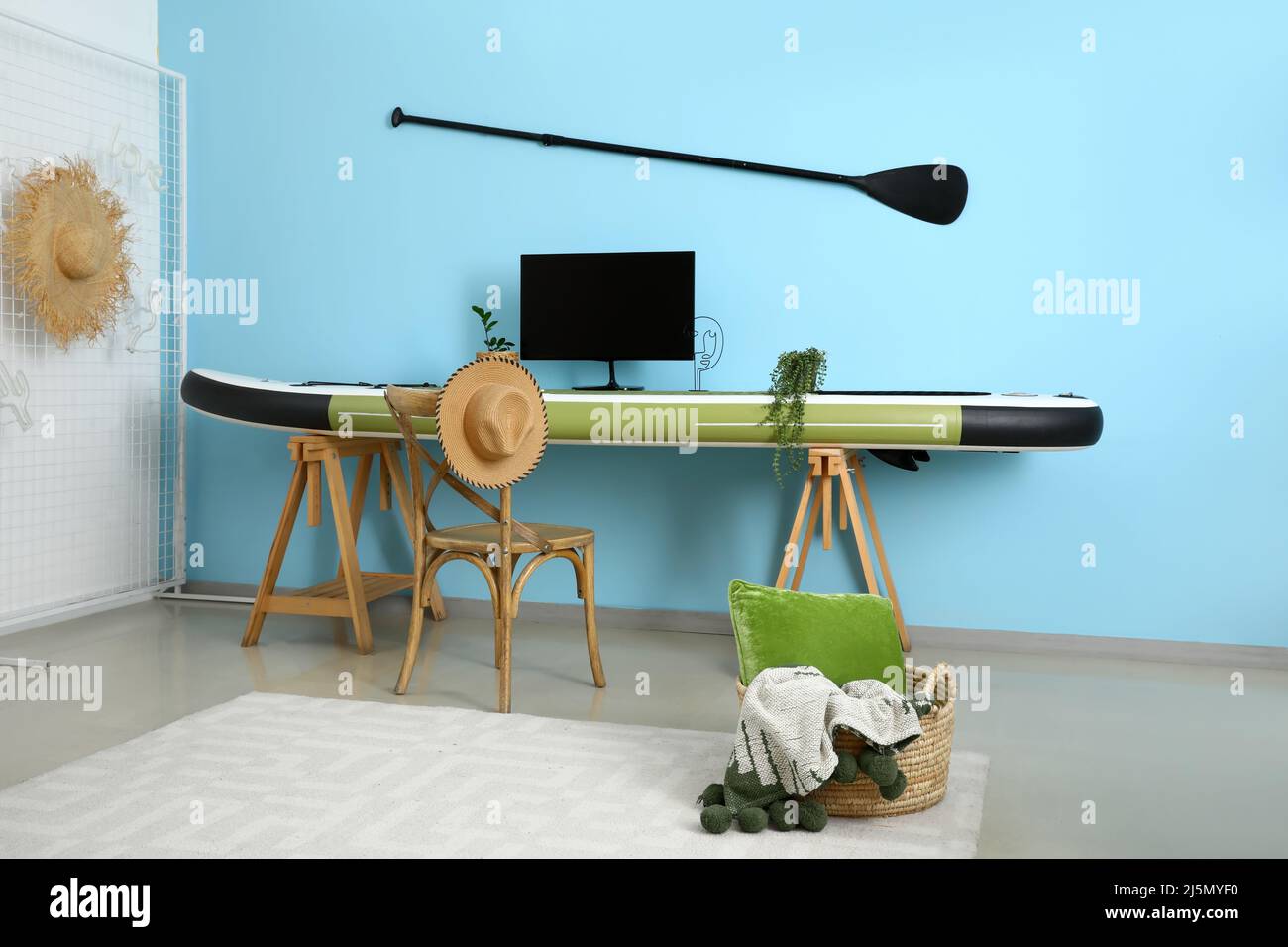 Interior of modern room with workplace and sup surfing board Stock ...