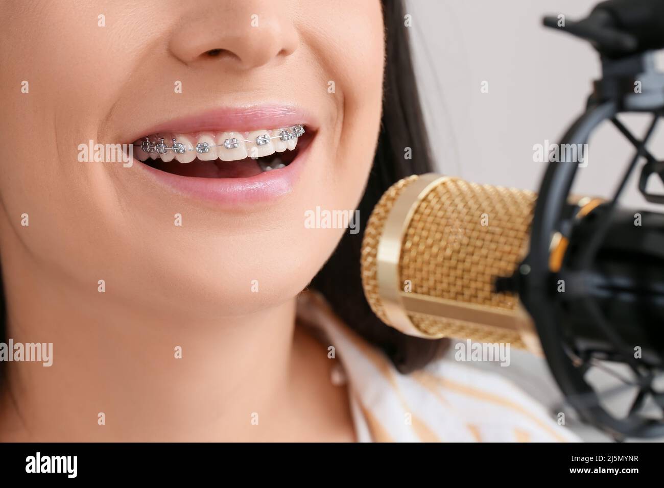 Female singer using radio microphone hi-res stock photography and ...
