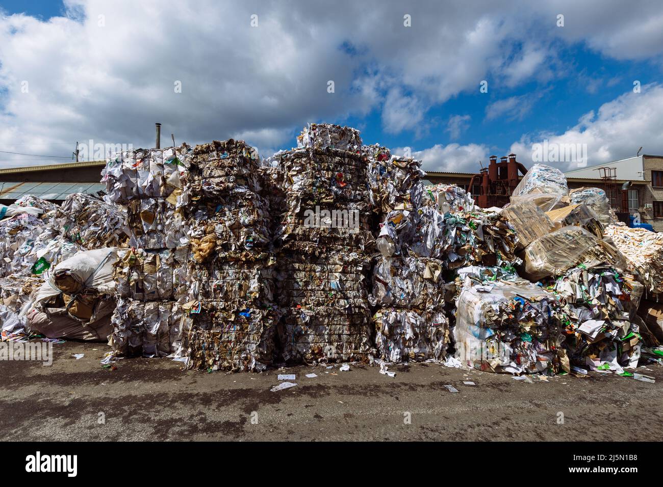 Stack of waste paper at the recycling factory Stock Photo - Alamy