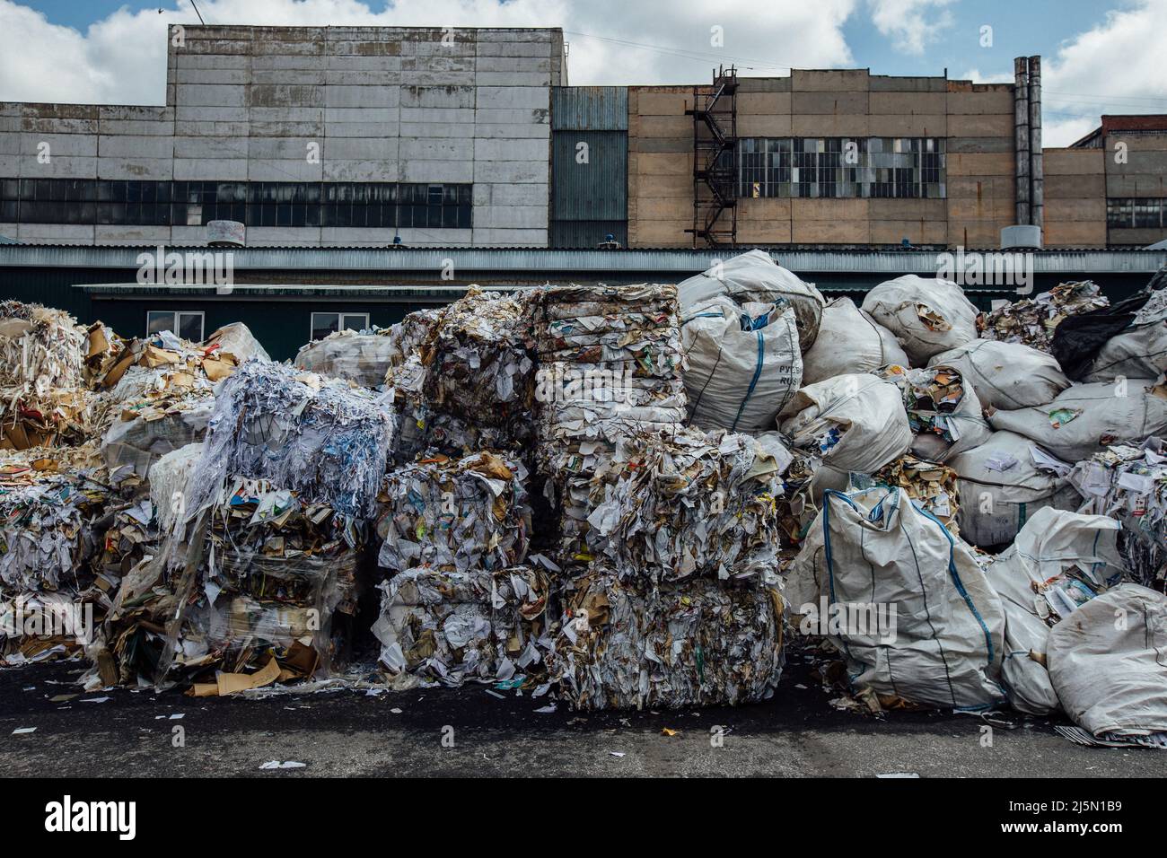 Stack of waste paper at the recycling factory Stock Photo - Alamy