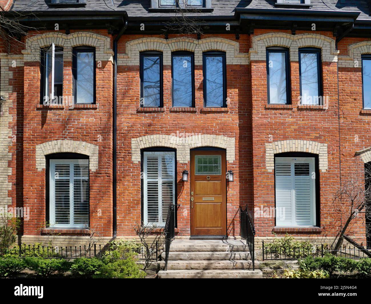 Restored and gentrified old row houses, with 19th century style ...