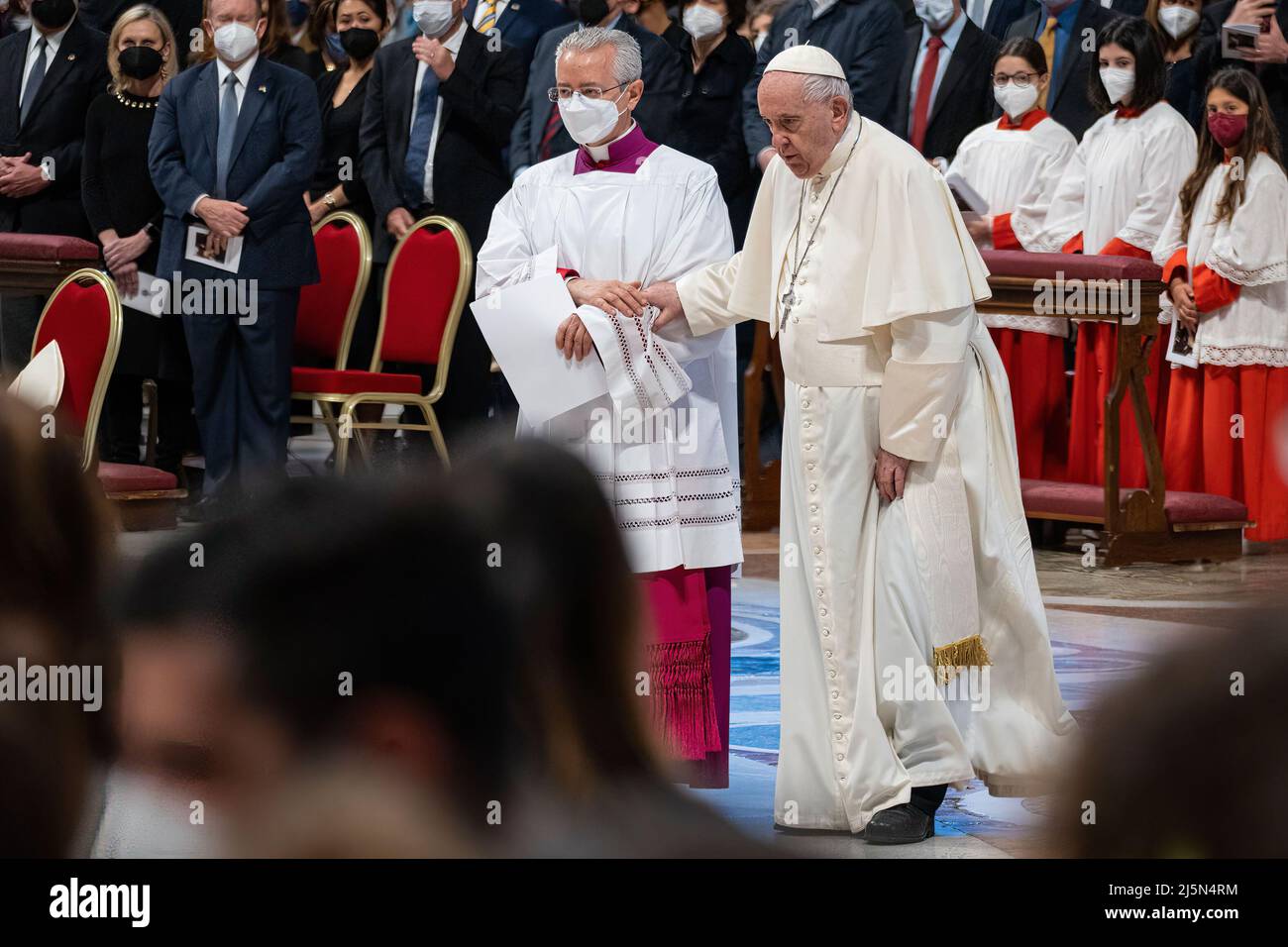 Vatican City, Vatican. 24th Apr, 2022. Pope Francis is assisted by his ...