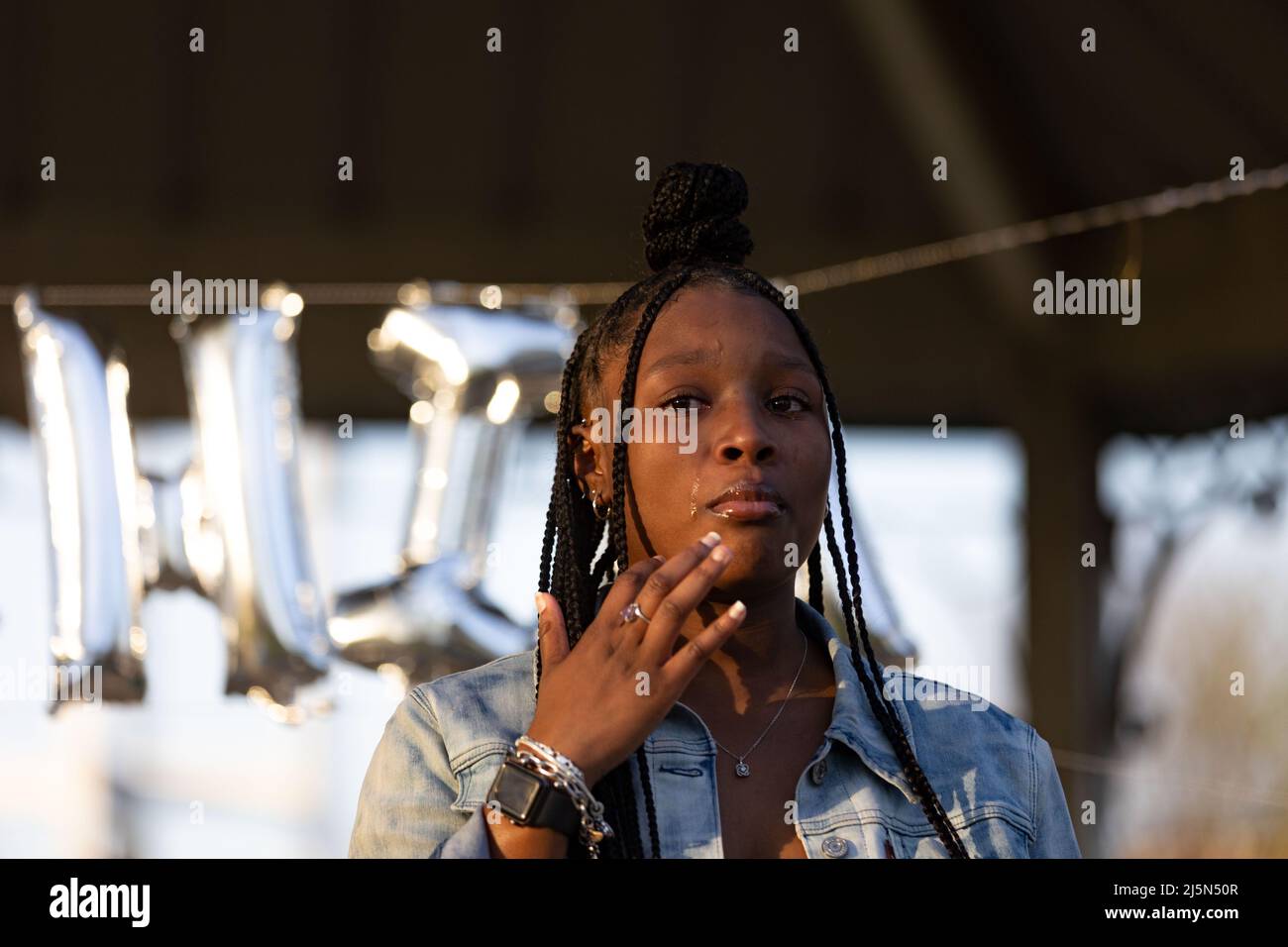 Da'Niah Bryant, 16, speaks at a vigil for her sister, Ma'Khia Bryant, a ...